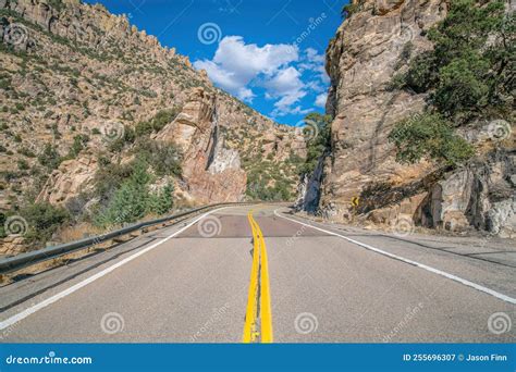 Mount Lemmon Arizona Highway With Metal Barriers In Between The Rocky