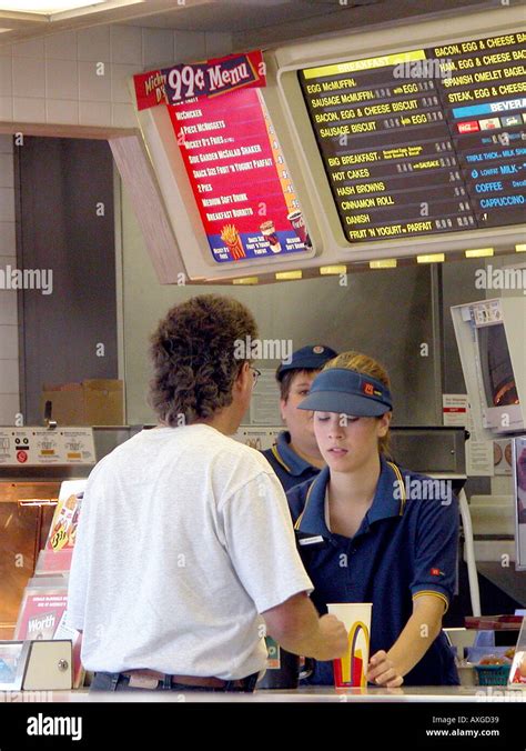 Adults Order Food At A Fast Food Restaurant Stock Photo Alamy