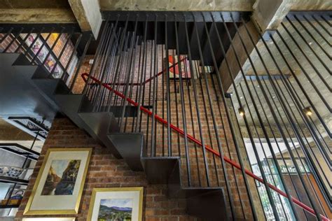 Perforated Screens Made From Reused Terracotta Roof Tiles Wrap Around