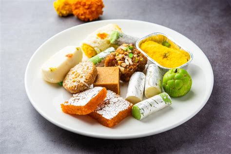 Premium Photo Indian Assorted Sweet Mithai Barfi In A Group
