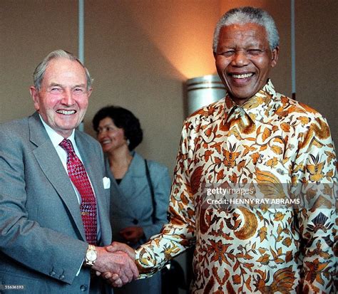 President Nelson Mandela Of South Africa Shakes Hands With David
