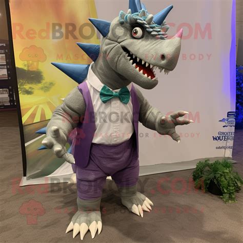 Gray Stegosaurus Mascot Costume Character Dressed With A Bermuda Shorts And Bow Ties Mascot