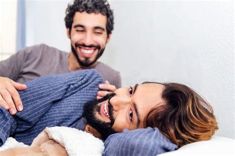 Male Couple Relaxing At Bed And Smiling Happy Stock Image Image Of