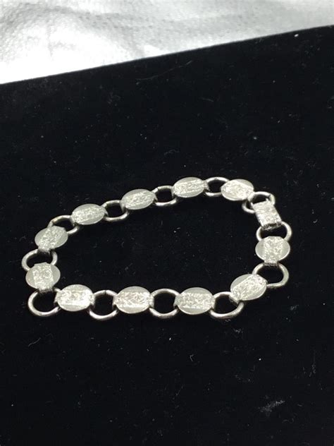 Silver Tone Sarah Cov Marked Bracelet