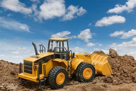 Wheel Loader Are Digging The Soil In The Construction Site Stock Photo