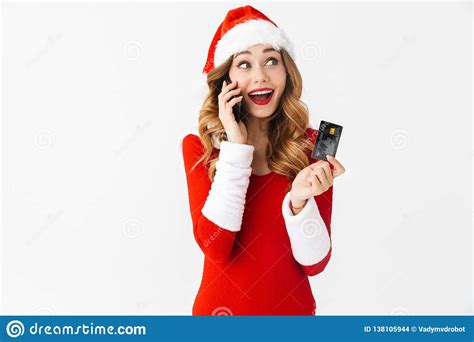 Emotional Woman In Christmas Costume Holding Credit Card And Talking By