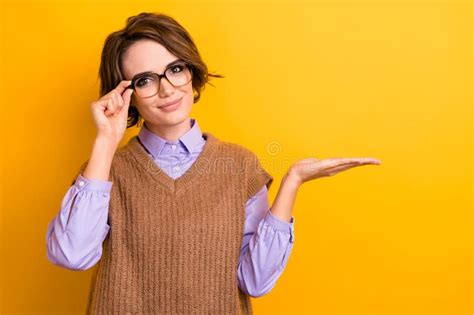Portrait Of Intelligent Woman Wear Knit Waistcoat Hold Glasses Palm