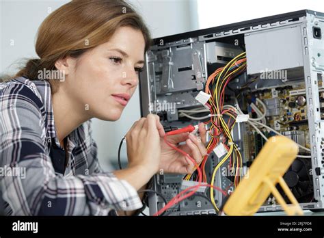 Concentrated Female Fixing Pc Stock Photo Alamy