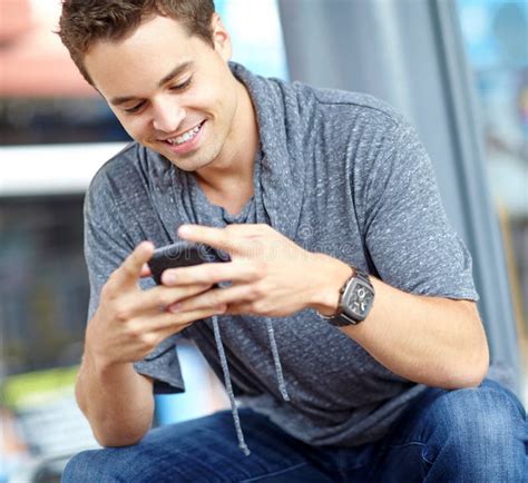 Train Station Smile And Man With Smartphone For Waiting Patience And