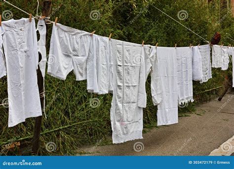 Old Underwear And Sheets Hanging To Dry Stock Image Image Of Retro