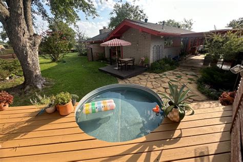 A Mostly Dirt Yard Gets A Makeover With A Stock Tank Pool Apartment Therapy