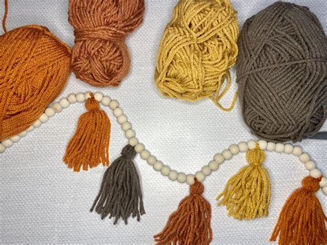 Diy Tassel Garland With Yarn And Wooden Beads Hootshack