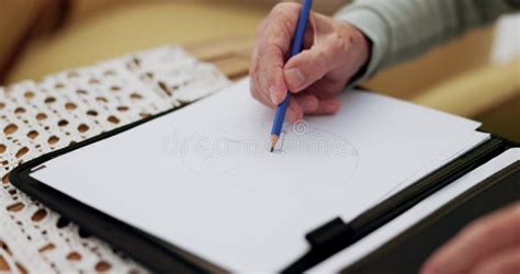 Writing Hand And Senior Person Drawing Clock For Dementia Memory Loss Or Self Assessment In A