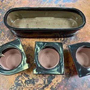 Accents Vintage 4piece Black Glazed Terra Cotta Plant Holder Poshmark