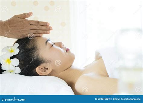 Beautiful Young Girl Having Face Massage In Spa Salon Stock Image