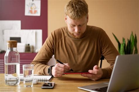 Free Photo Adult Male Illustrator Working On Tablet Device