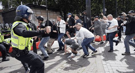 Uk Grapples With Worst Riots In 13 Years Over 100 Held As Far Right