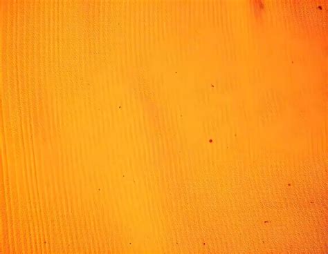 Une Texture De Bois Jaune Avec Un Fond Jaune Et Orange Image Premium