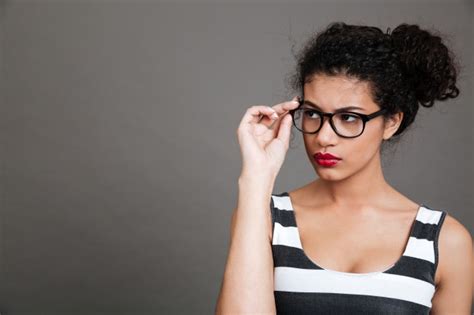 Free Photo Young Woman Wearing Glasses And Striped Shirt