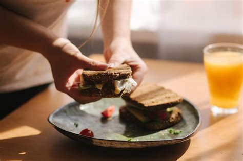 Premium Photo Woman Hold In Hands Bitten Sandwich Rye Toasted Bread