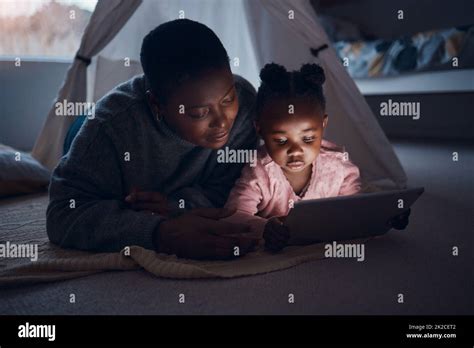 What Are You Going To Read Mom Shot Of A Mother Reading Bedtime