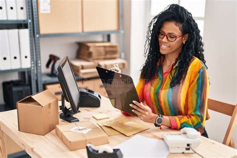 African American Woman Business Worker Writing On Document Working At