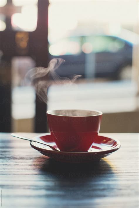 Relaxing With A Hot Tea By Stocksy Contributor Helen Yin Stocksy