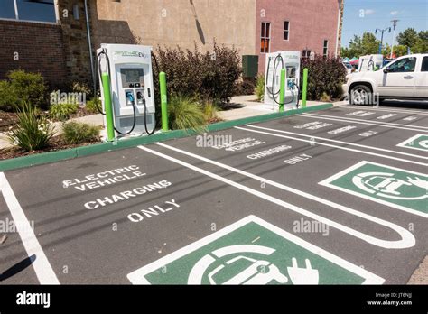 Ev Electric Vehicle Charging Stations And Parking Spots At The Front