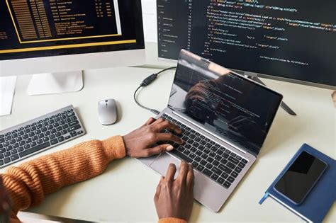 Premium Photo Hands Of Young Man Testing Programming Code For New