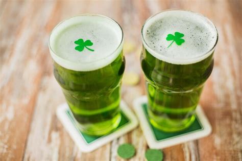 Premium Photo Glasses Of Green Beer With Shamrock And Gold Coins