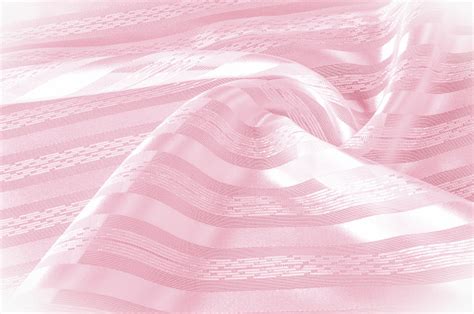 배경 질감 패턴입니다 가벼운 스트라이프 핑크 실크 직물입니다 부드럽고 우아한 핑크 실크 나 새틴 질감 배경으로 사용할 수 있습니다 로즈 쿼 츠 핑크 파스텔 색조의 추세 0