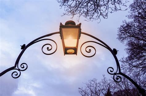 Premium Photo Archway Entrance With Shining Lantern Lamp Wrought Iron