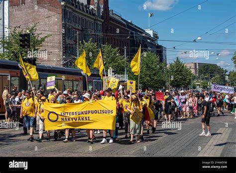 People With Banner Signs And Flags Marching For Intersex Rights At