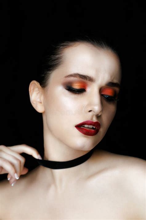 Close Up Portrait Of Gorgeous Young Woman With Red Lips And Bright