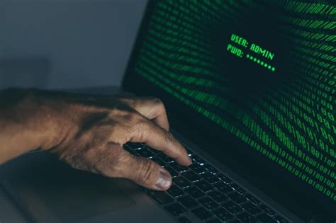 Premium Photo Hand Typing On A Laptop Keyboard Green Numbers On