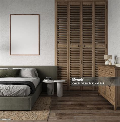 아프리카 민족 스타일의 침실 인테리어 디자인 아파트 짙은 녹색 담요가 있는 침대 소박한 간단한 모형 공간 힙스터 로프트 배경 이미지입니다 3d 렌더링 고품질 3d 그림