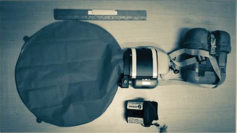 Top A 10 Minute Duration Scsr Unit Left And Carrying Case Right