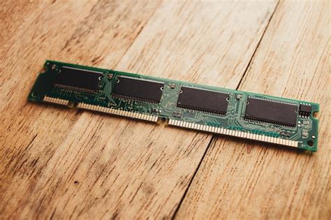 Premium Photo One Single Computer Ram Module On Top Of A Wooden Desk