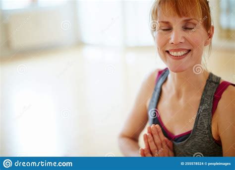 Feeling Totally Relaxed After Her Yoga Workout A Woman Doing Yoga