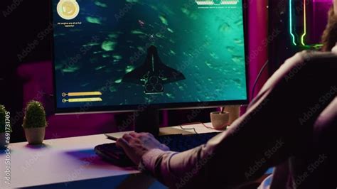 Man Using Gaming Keyboard To Fly Spaceship In SF Videogame Close Up On