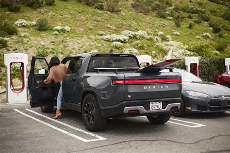 Tesla Supercharger Network Opens To Rivian Vehicles