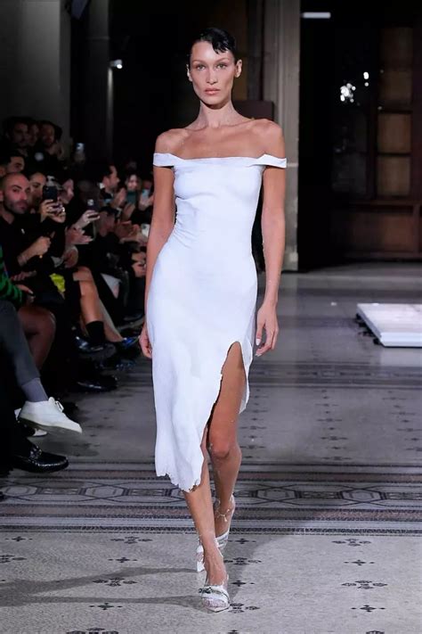 Bella Hadid Gets A Spray Dress At Pfw