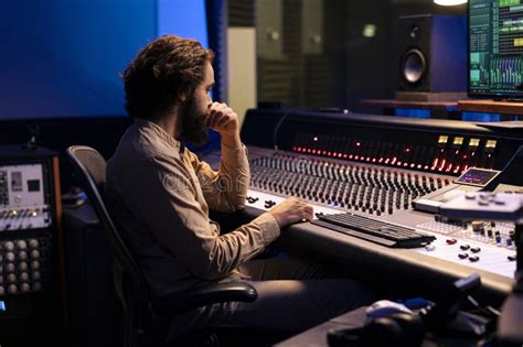 Sound Designer Mixing And Mastering Music In Recording Studio Stock