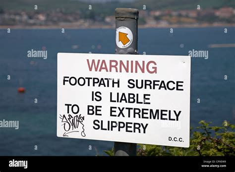Warning Footpath Surface Is Liable To Be Extremely Slippery Hi Res Stock Photography And Images