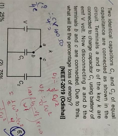 Two Identical Capacitors C1 And C2 Of Equal Capacitance Are Connected A