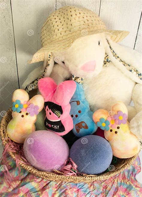 Long Eared Hat Wearing Easter Bunny Colorful Easter Eggs Assortment