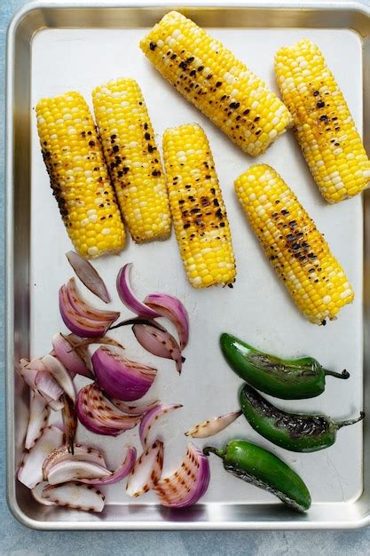 Premium Photo Grilled Vegetables On A Metal Tray