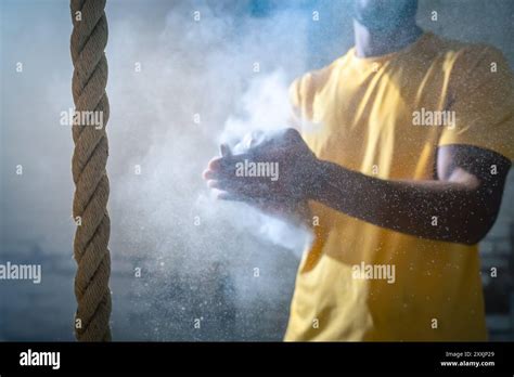 Strong Fit Muscular Fitness Man Putting Magnesium Sports Chalk Powder