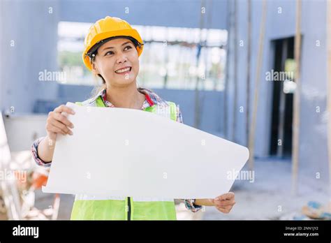 Asian Woman Engineer Worker Work In Construction Site Smart Builder Architect Female In Safety