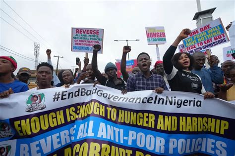 Live Bullets Fired At Protesters As Nigerians Protest Soaring Living